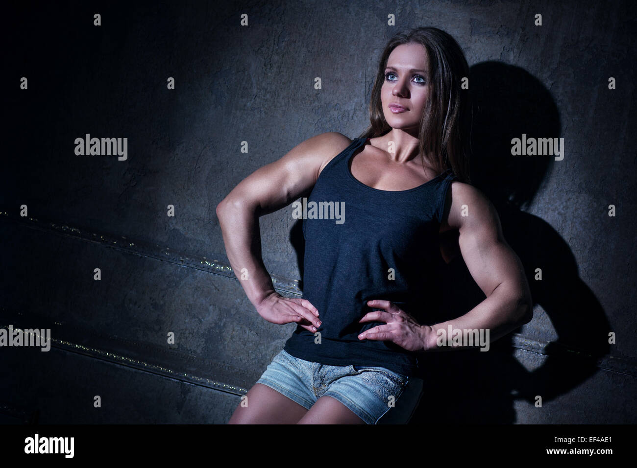 Young strong woman bodybuilder Stock Photo - Alamy