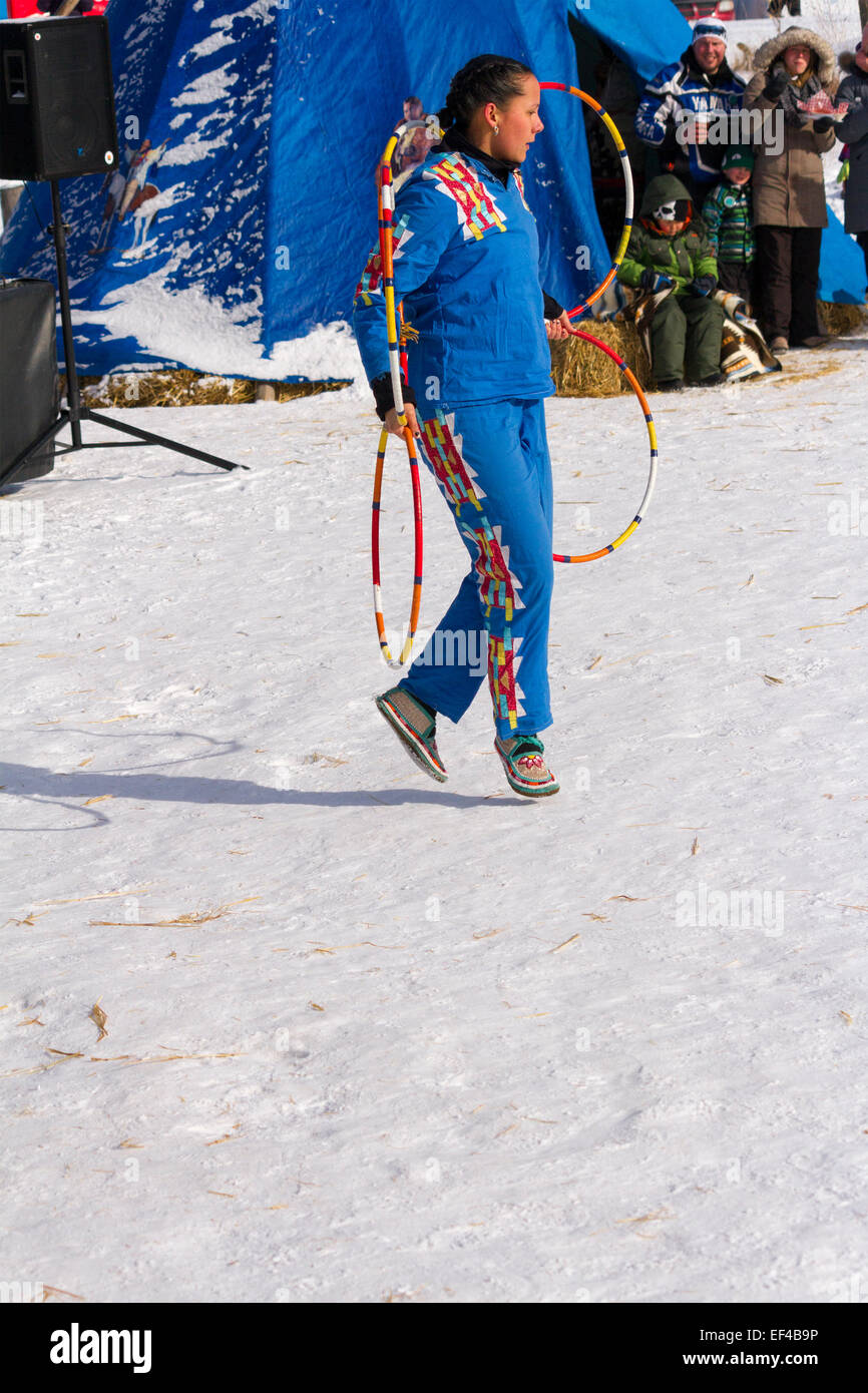 Female aboriginal First Nations dancer does the dance of the hoops at ...
