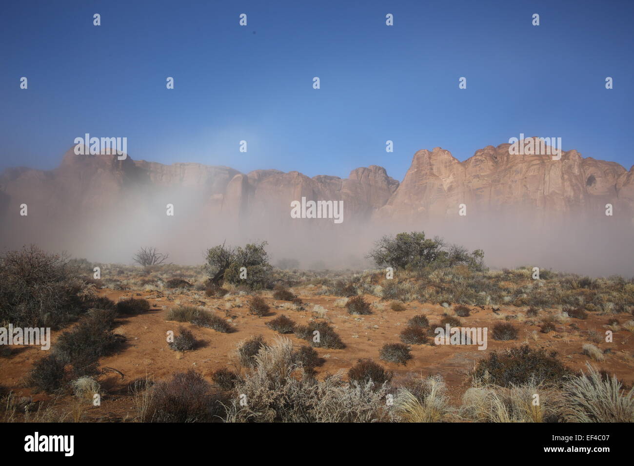 morning fog lifts in Arches national park in Utah photo by jen lombardo ...