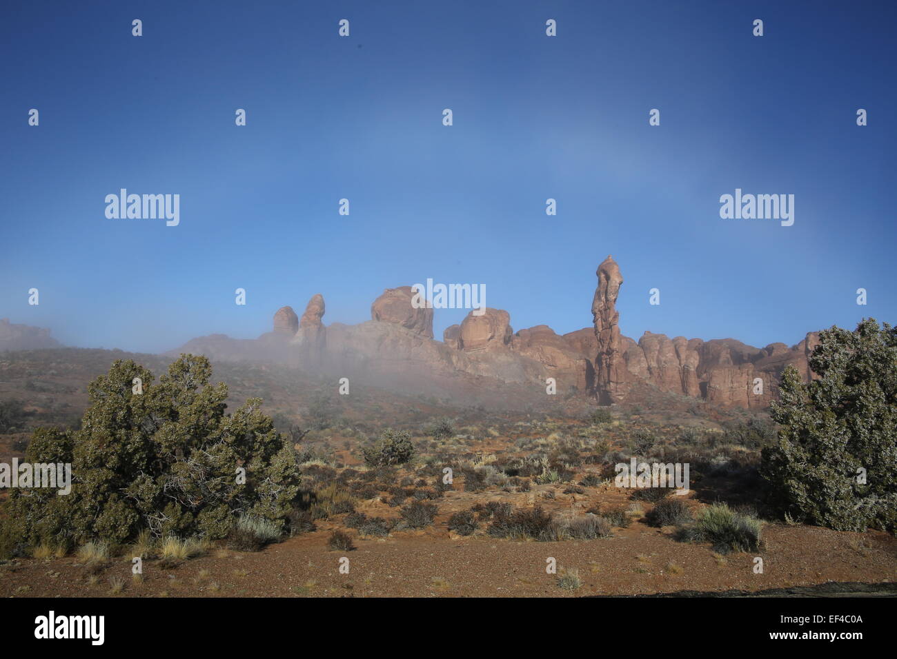 inversion fog after sunrise in arches national park, utah photo by jen ...