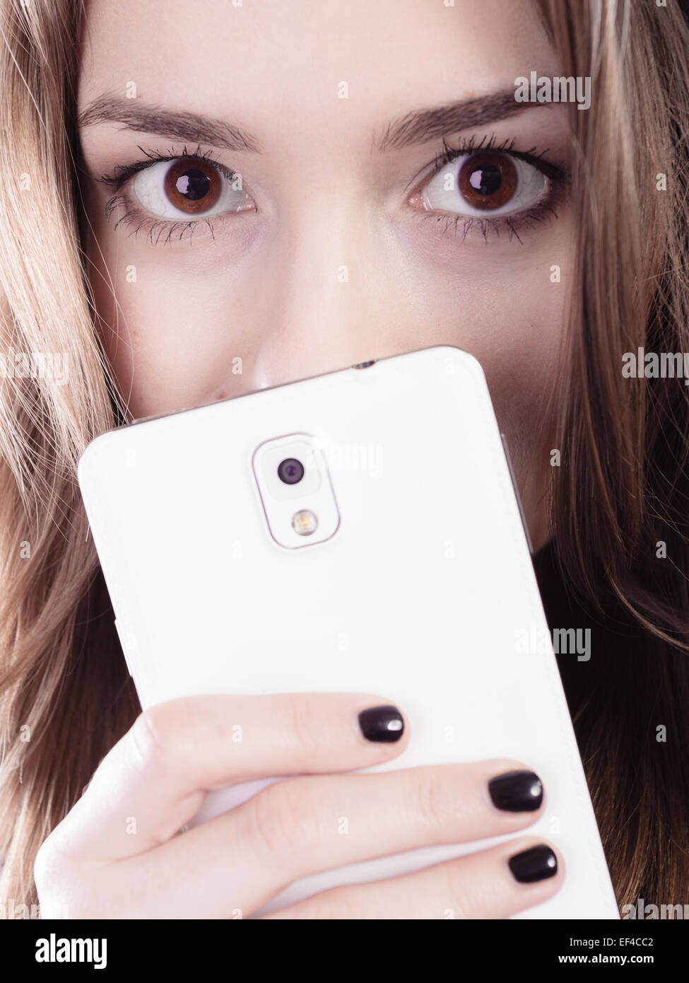 Technology and communication. Closeup young woman teenage girl covering ...