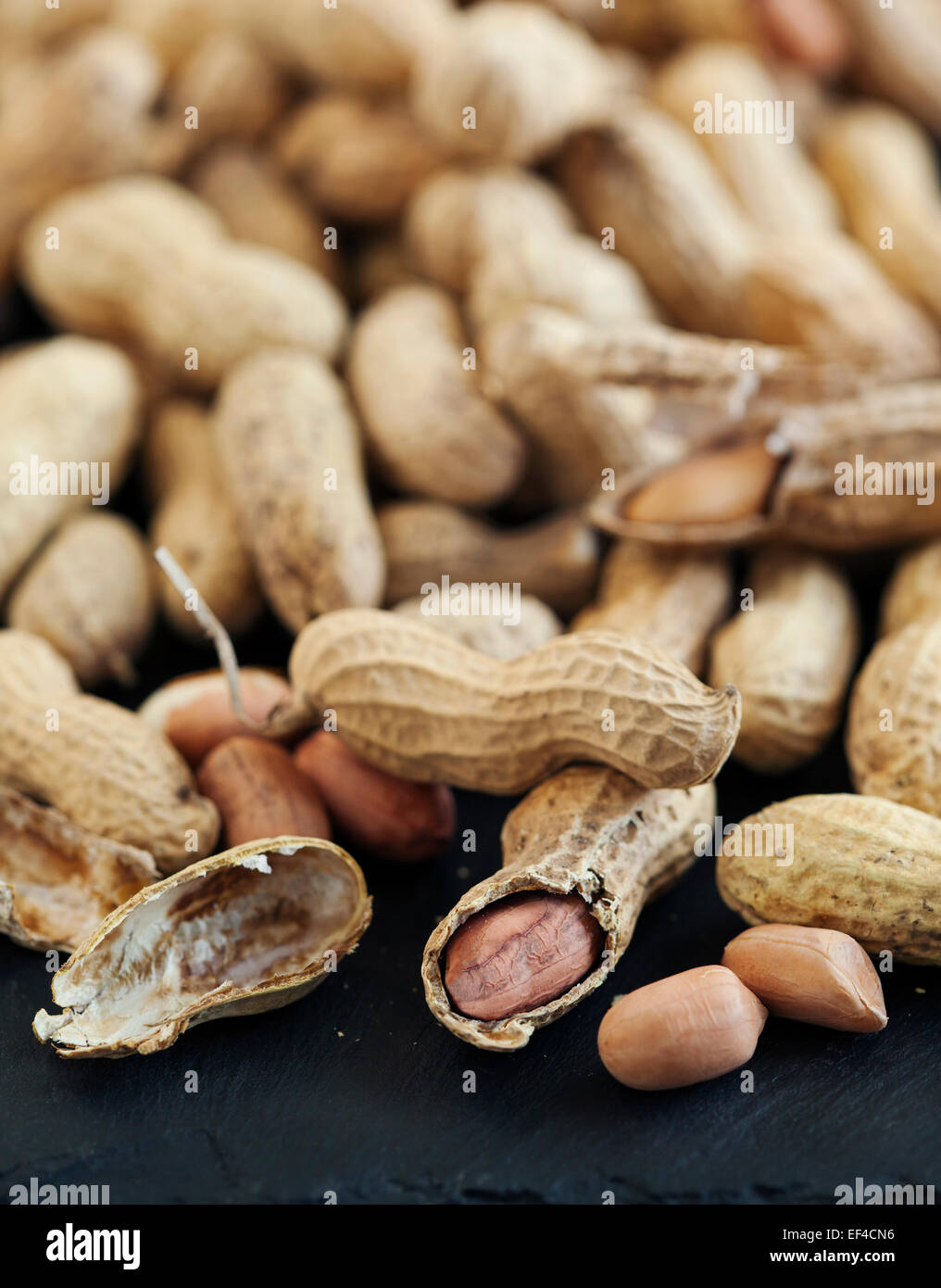 Raw peanuts. Shallow depth of field Stock Photo - Alamy