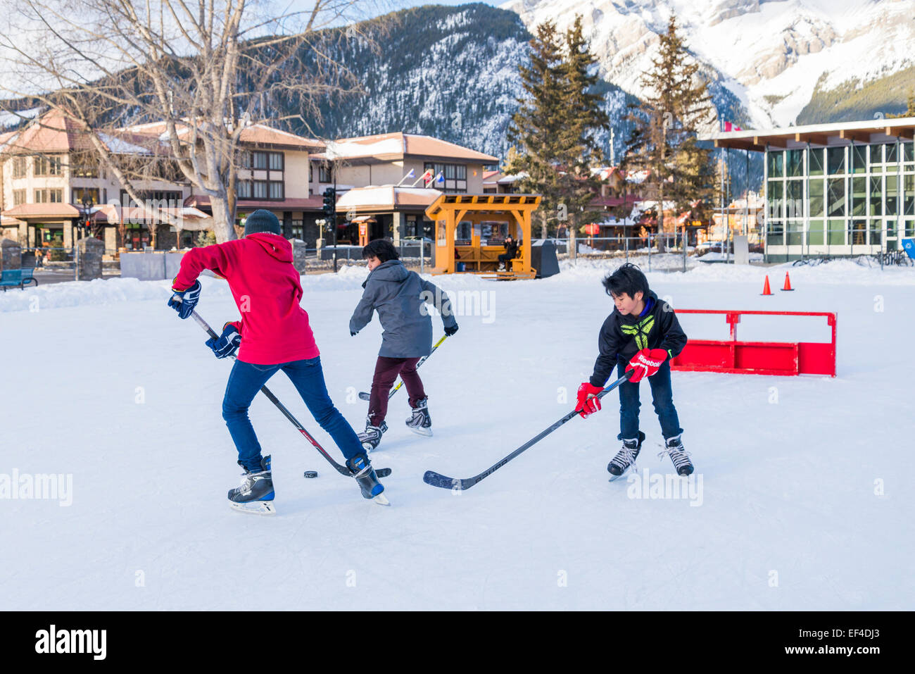 Kids playing ice hockey, Banff, Banff National Park, Alberta, Canada ...