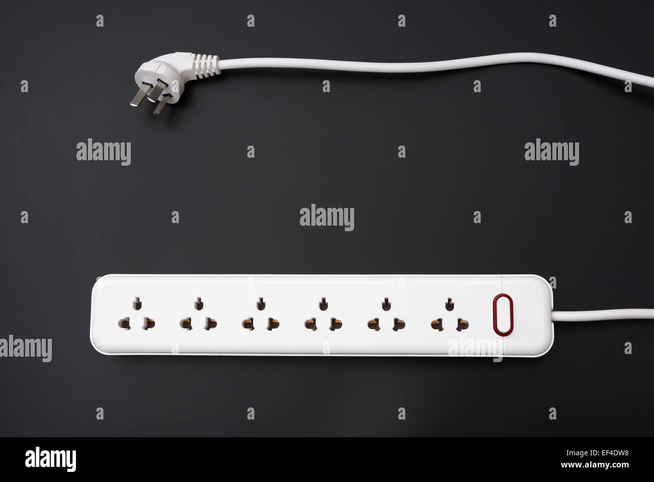 multi sockets power extension on black Stock Photo - Alamy