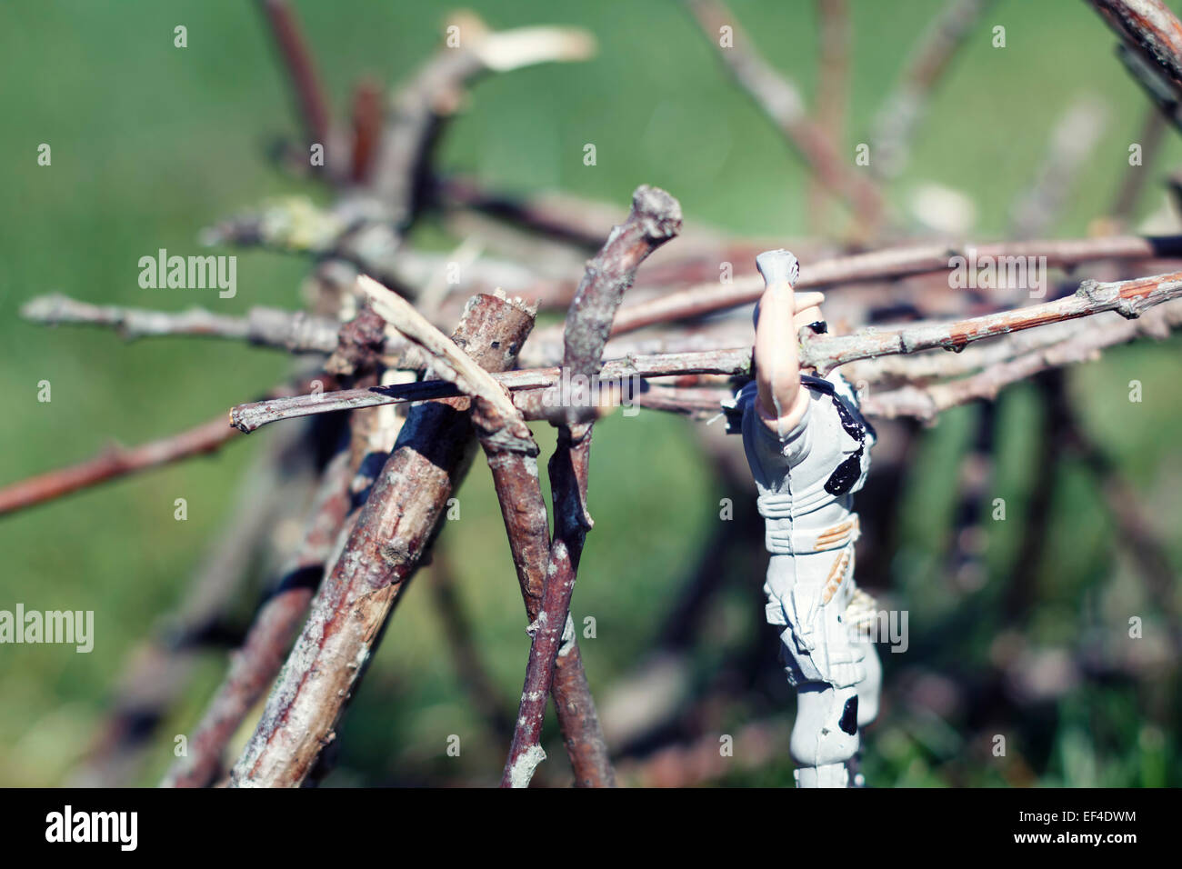 man toy figurine suspended sticks wood Stock Photo - Alamy