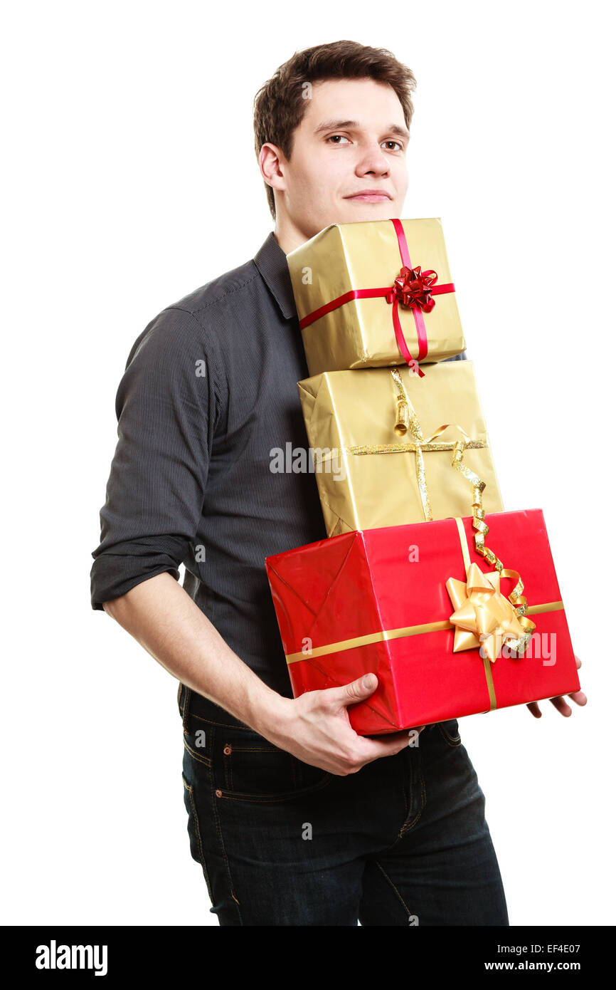Holiday and special occasion. Young handsome man giving a lot of ...