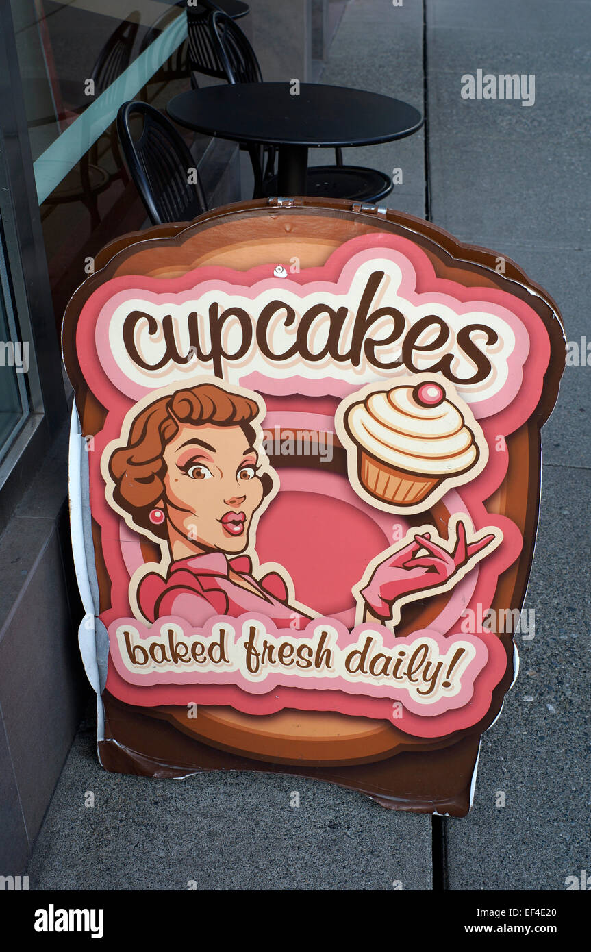 Cupcakes sign on the sidewalk outside a bakery cafe in Vancouver, BC ...