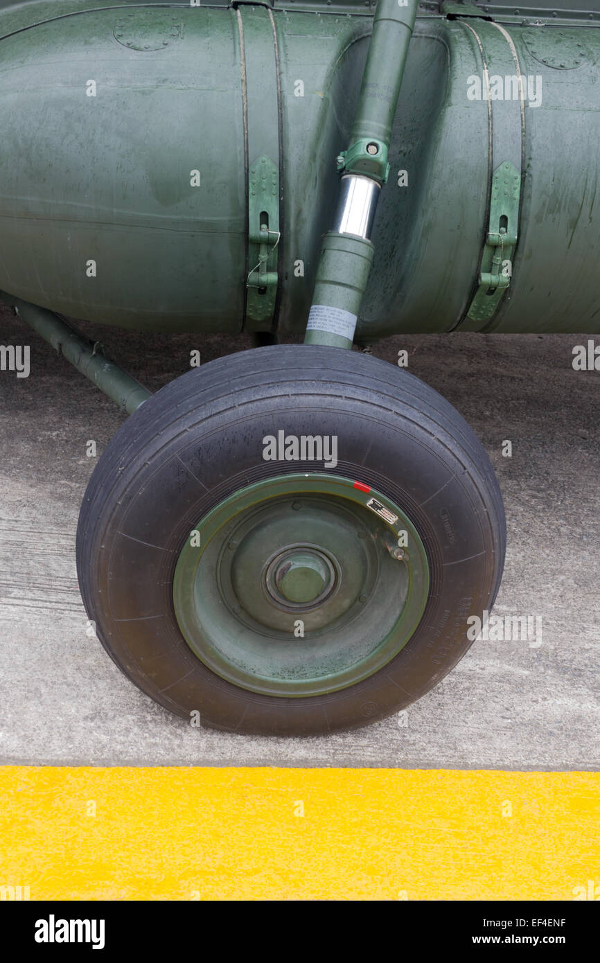 A Military Helicopter Wheel with yellow line on Runway Stock Photo - Alamy