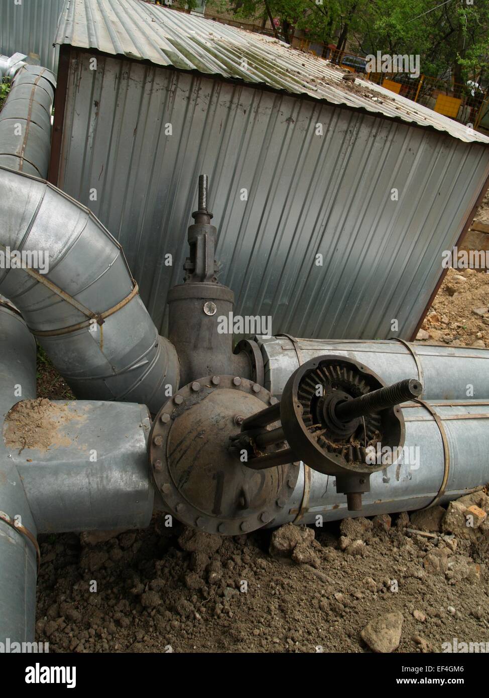 Pipes, valves, taps and walls Stock Photo - Alamy