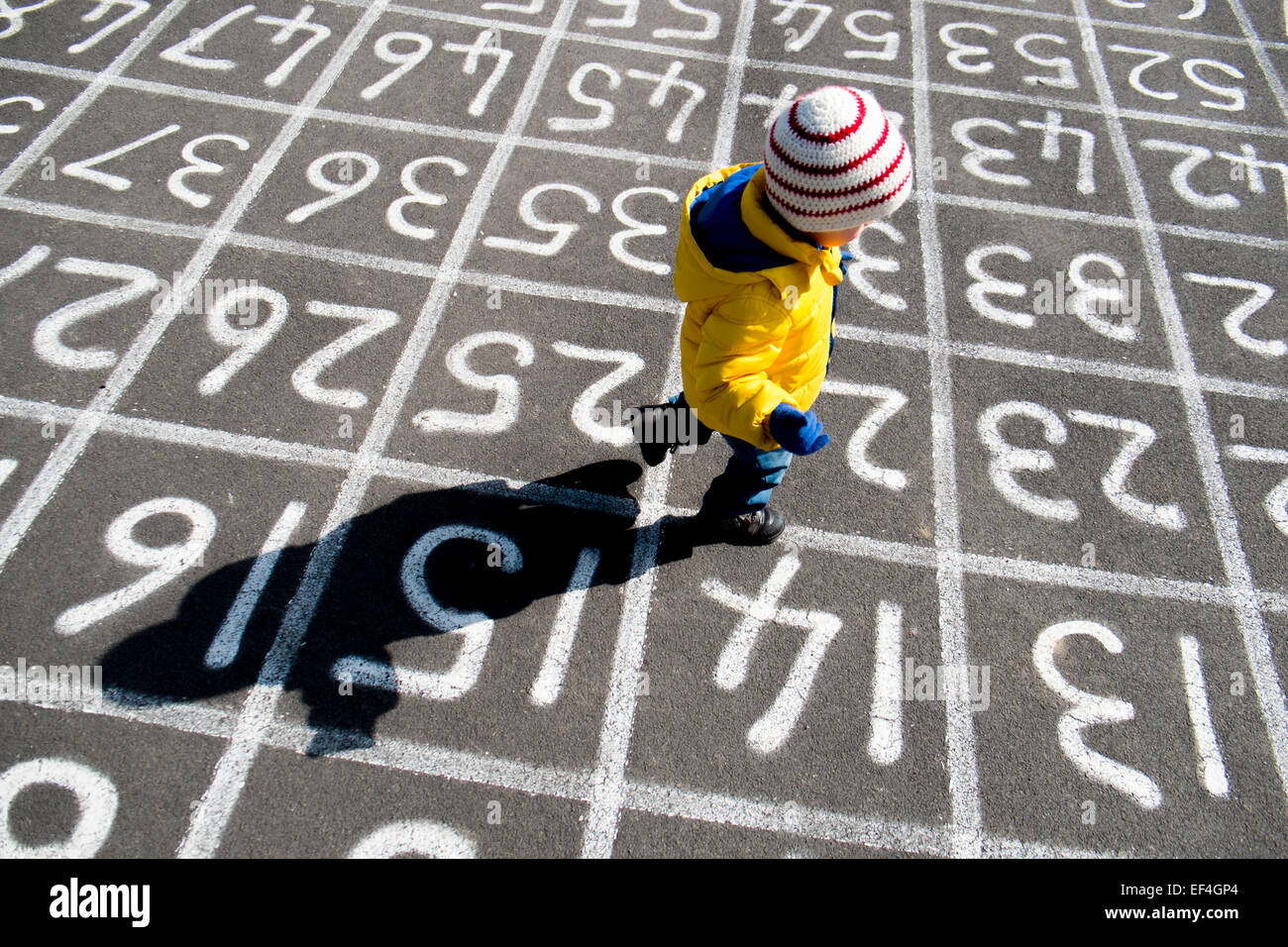 child playing hopscotch Stock Photo - Alamy
