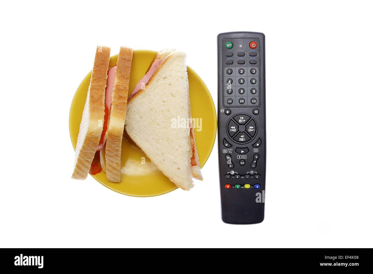 new universal remote control with sandwiches on white background Stock ...