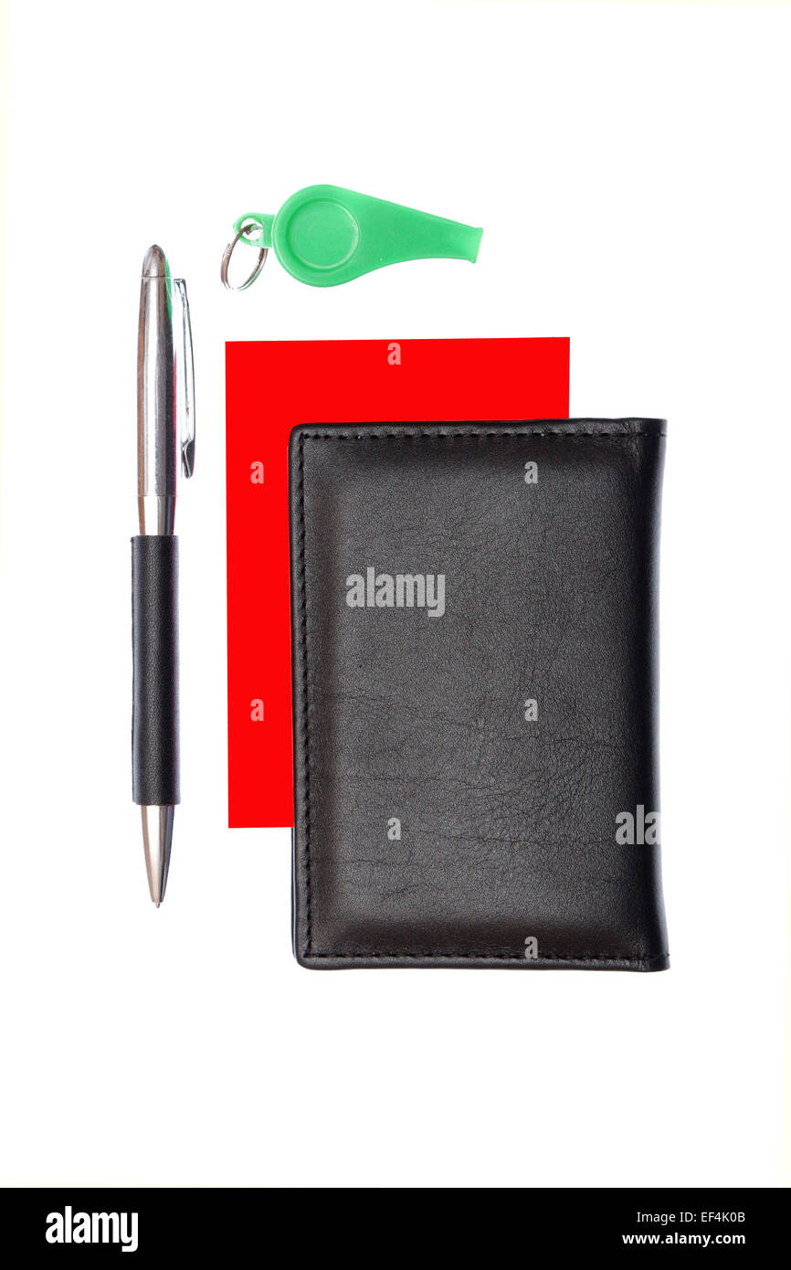 green plastic whistle and red card on white background Stock Photo - Alamy