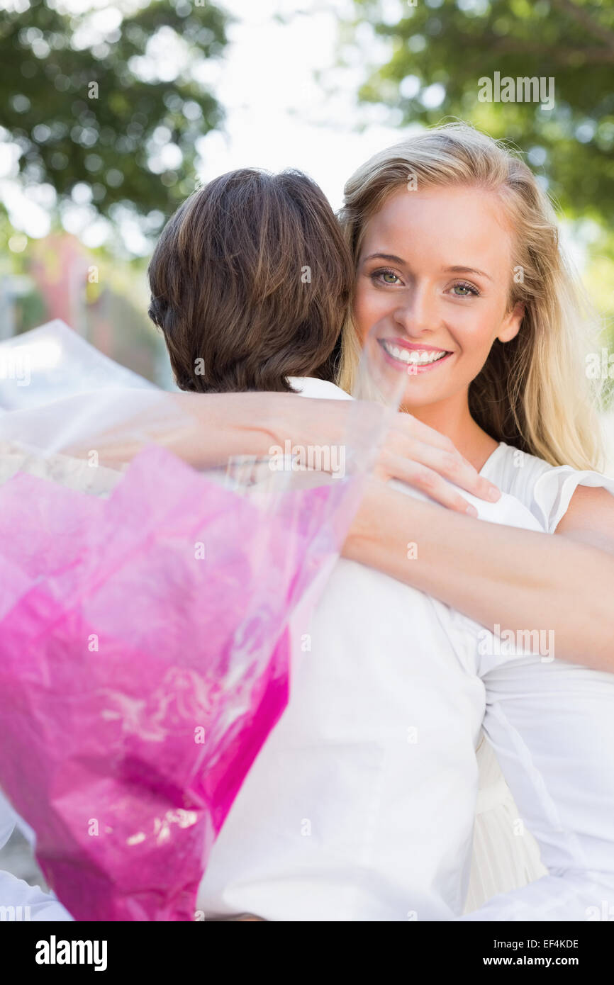 Attractive couple hugging each other Stock Photo - Alamy