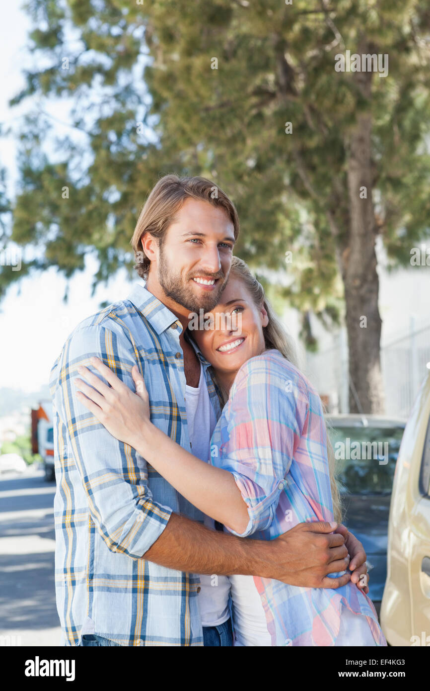 Cute couple standing and hugging Stock Photo - Alamy