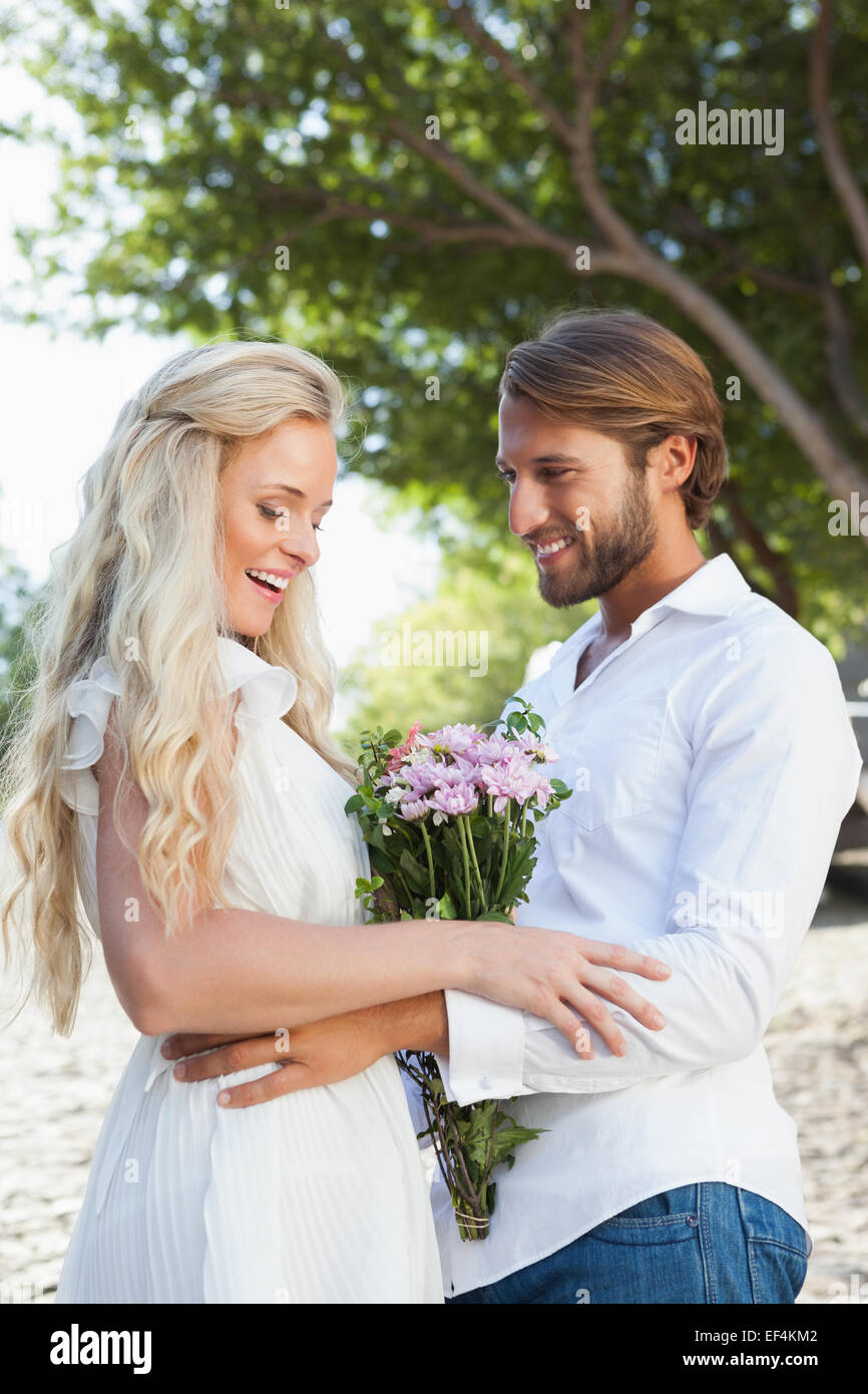 Cute couple hugging and smiling Stock Photo - Alamy