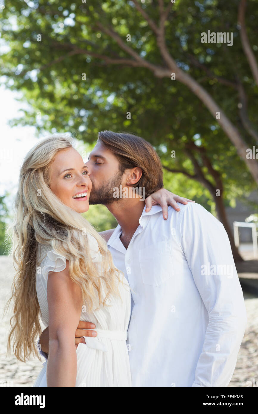 Cute couple hugging and smiling Stock Photo - Alamy
