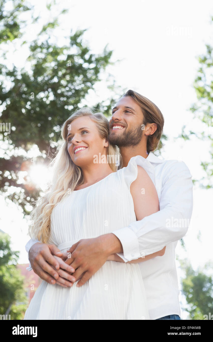 Cute couple hugging and smiling Stock Photo - Alamy