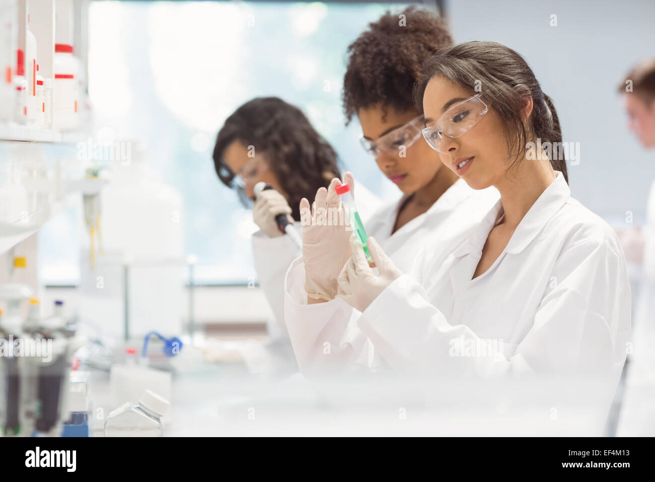 Science students working in the laboratory Stock Photo - Alamy