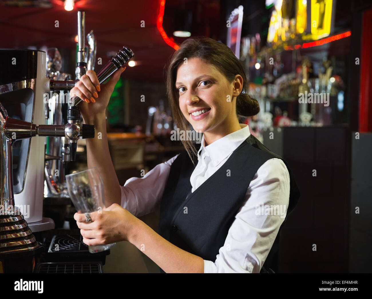Barmaid pulling a pint hi-res stock photography and images - Alamy