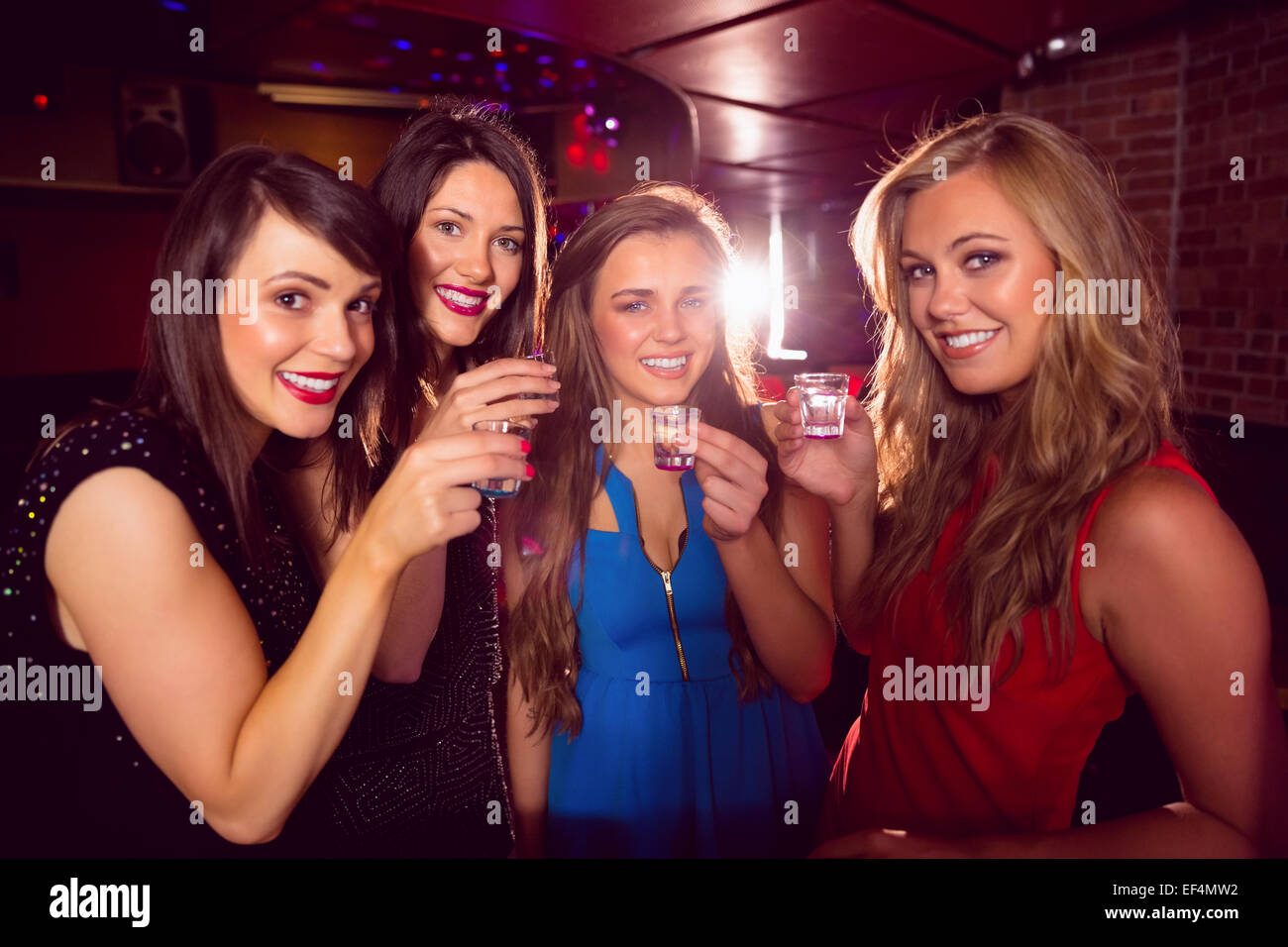 Woman drinking alcohol bar shots hi-res stock photography and images ...