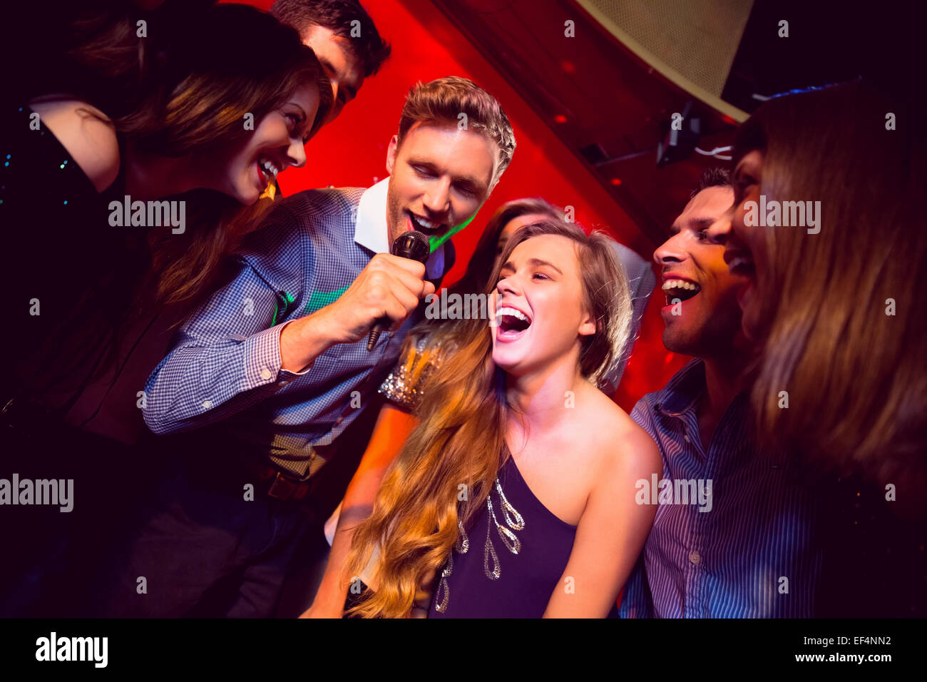 Man woman dancing singing together hi-res stock photography and images ...