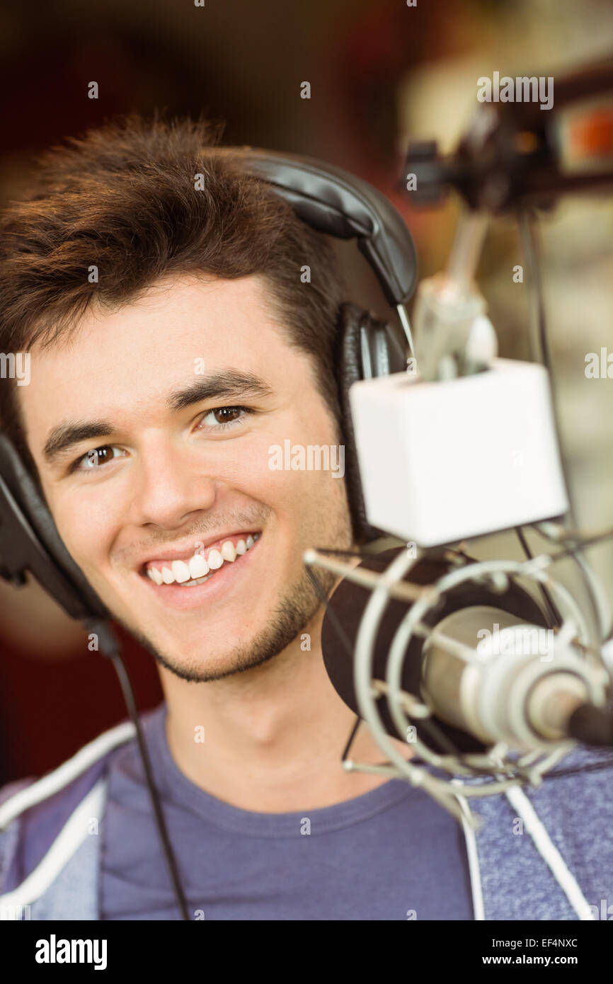 Portrait of an university student recording audio Stock Photo - Alamy