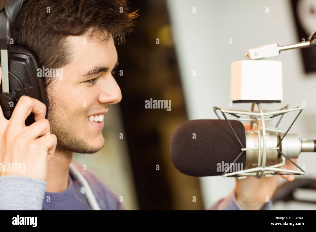 Portrait of an university student recording audio Stock Photo - Alamy