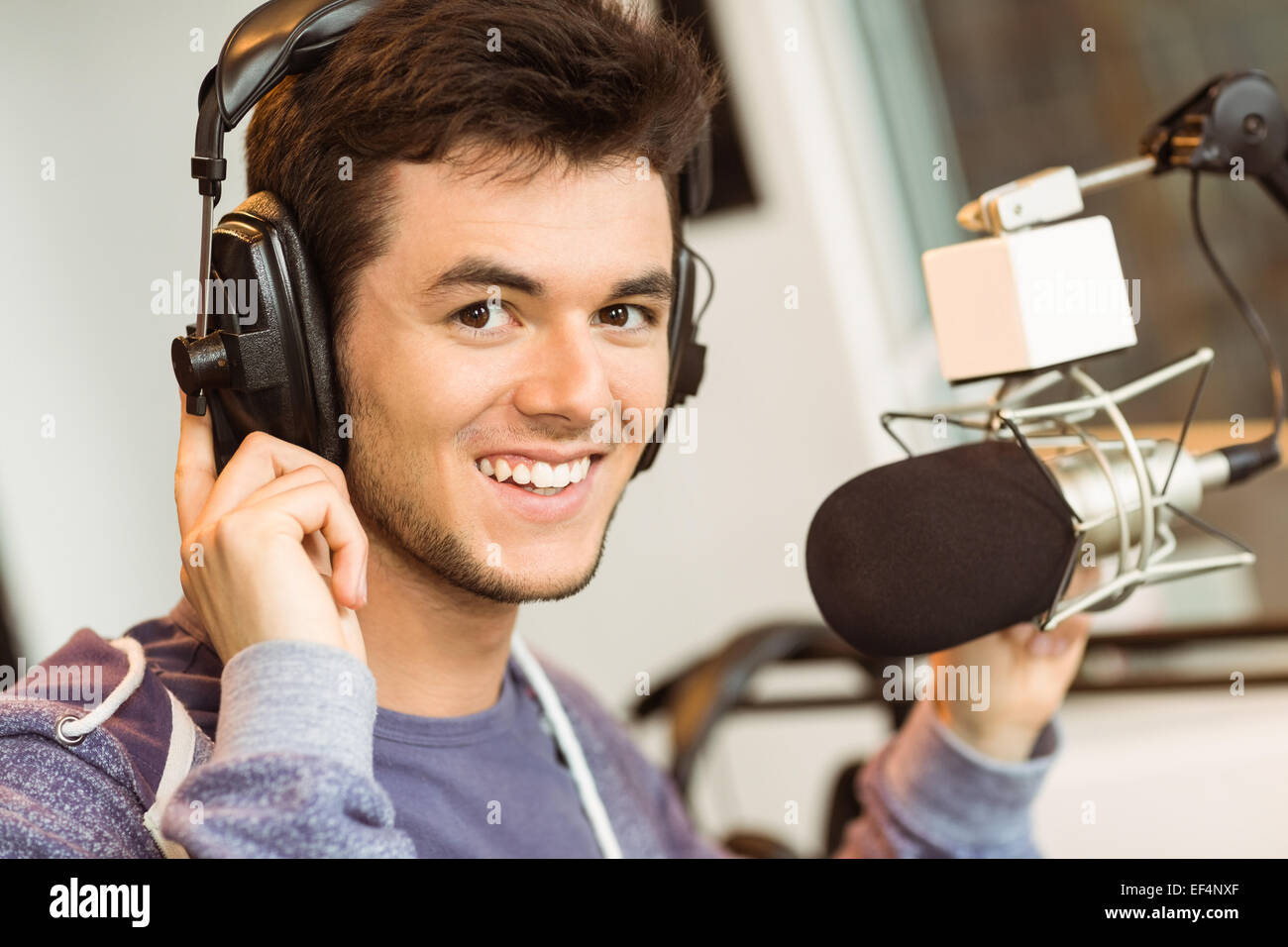 Portrait of an university student recording audio Stock Photo - Alamy