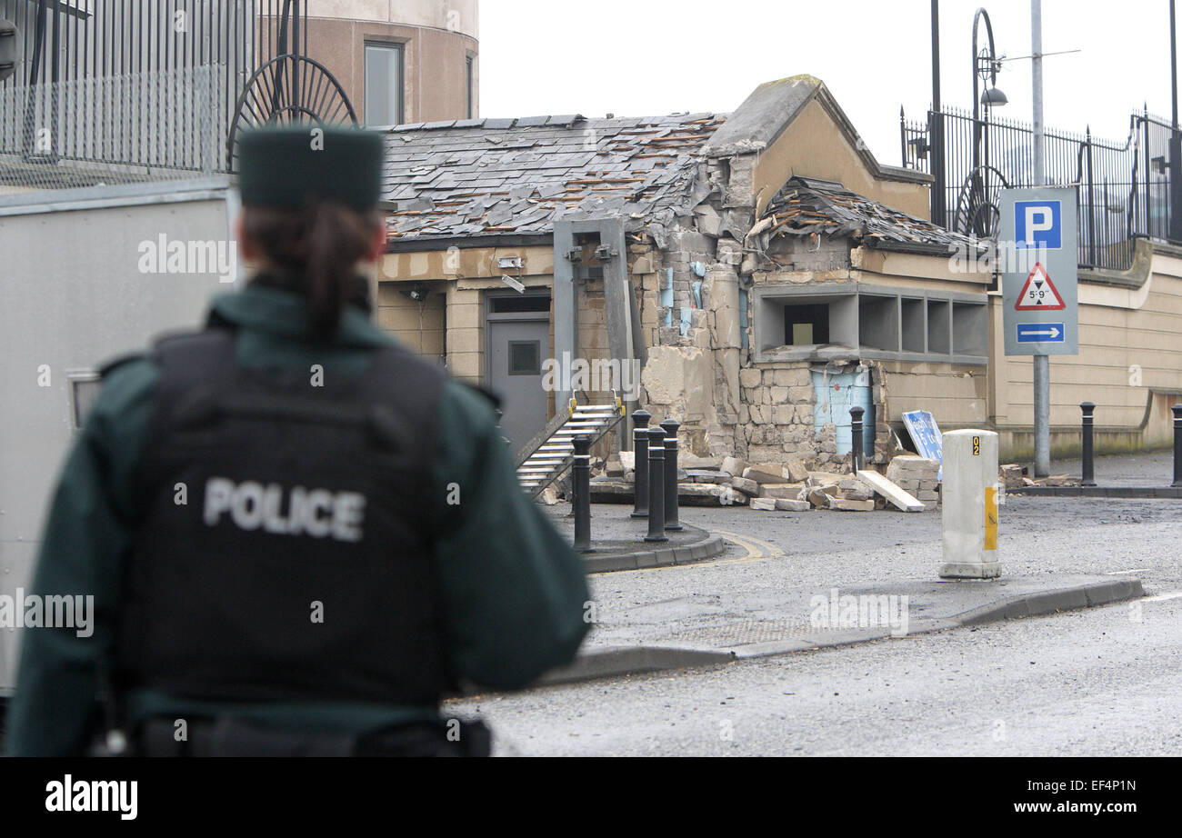 UNITED KINGDOM, Newry : Workmen repair damage buildings overlooking the ...