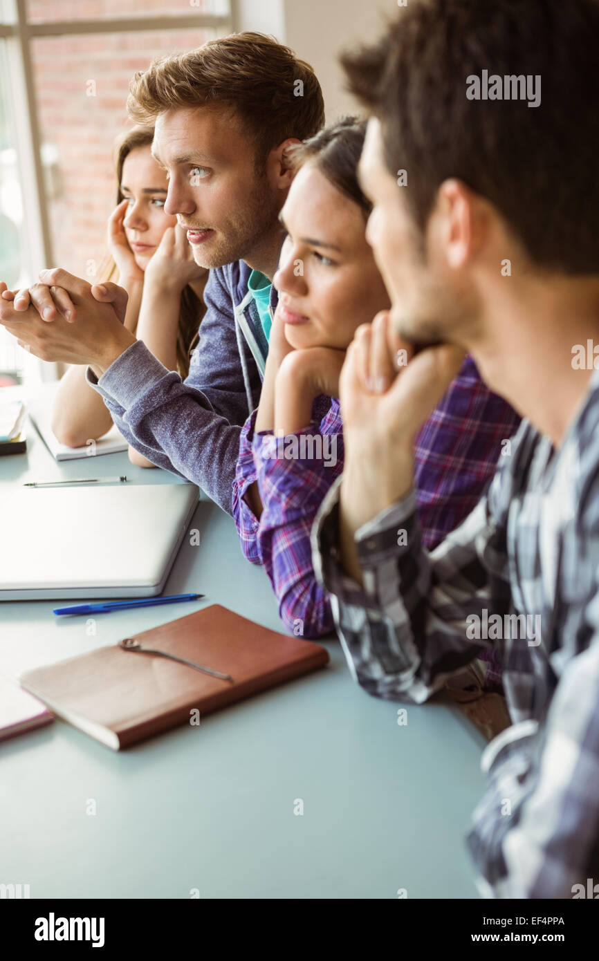 Smiling friends students studying together Stock Photo - Alamy
