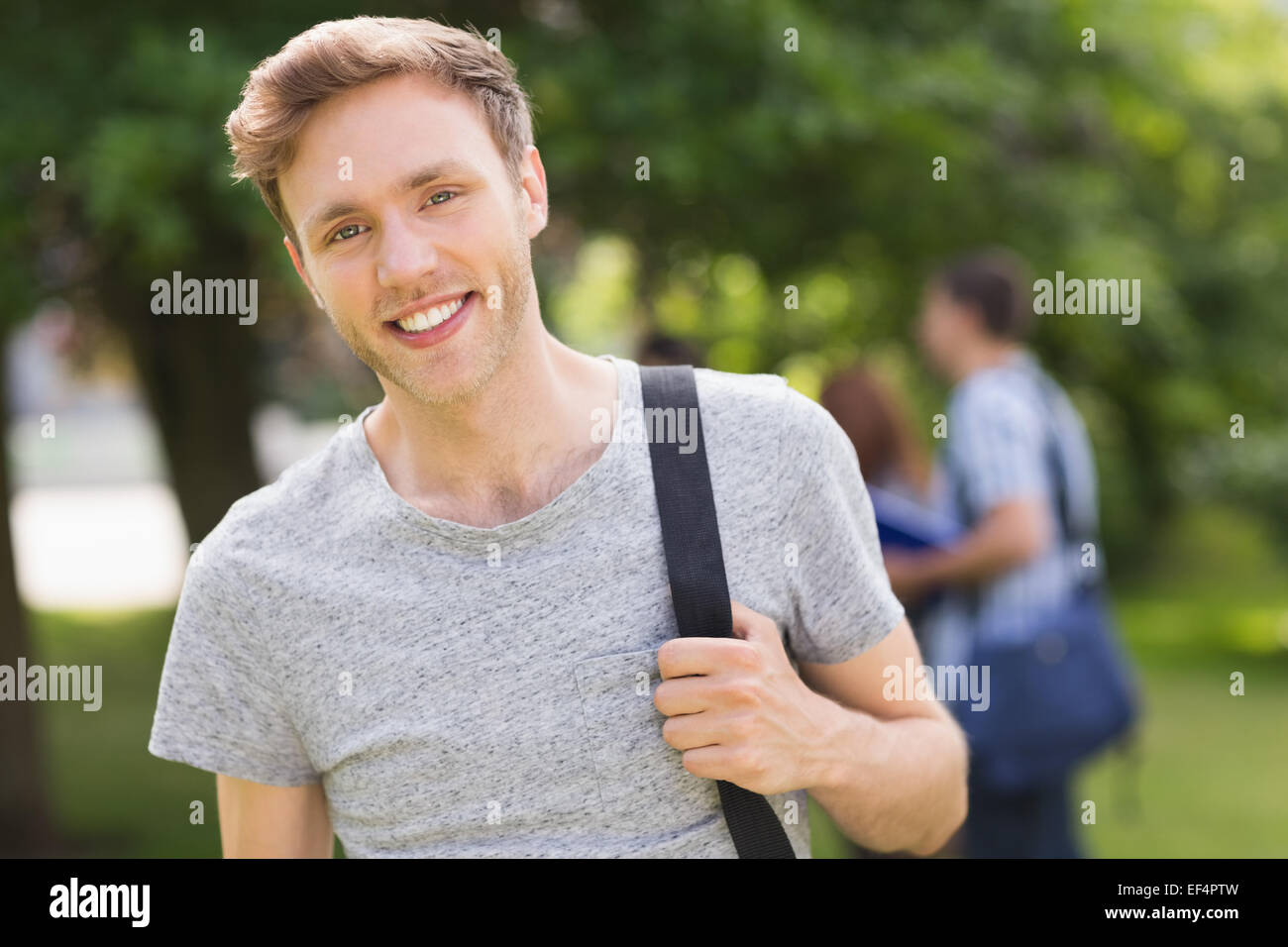 Handsome college student on campus hi-res stock photography and images ...