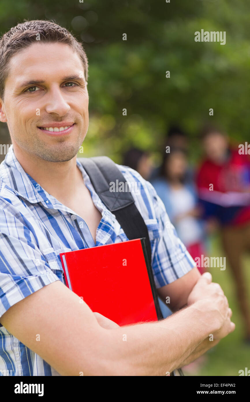 Happy student smiling at camera outside on campus Stock Photo - Alamy