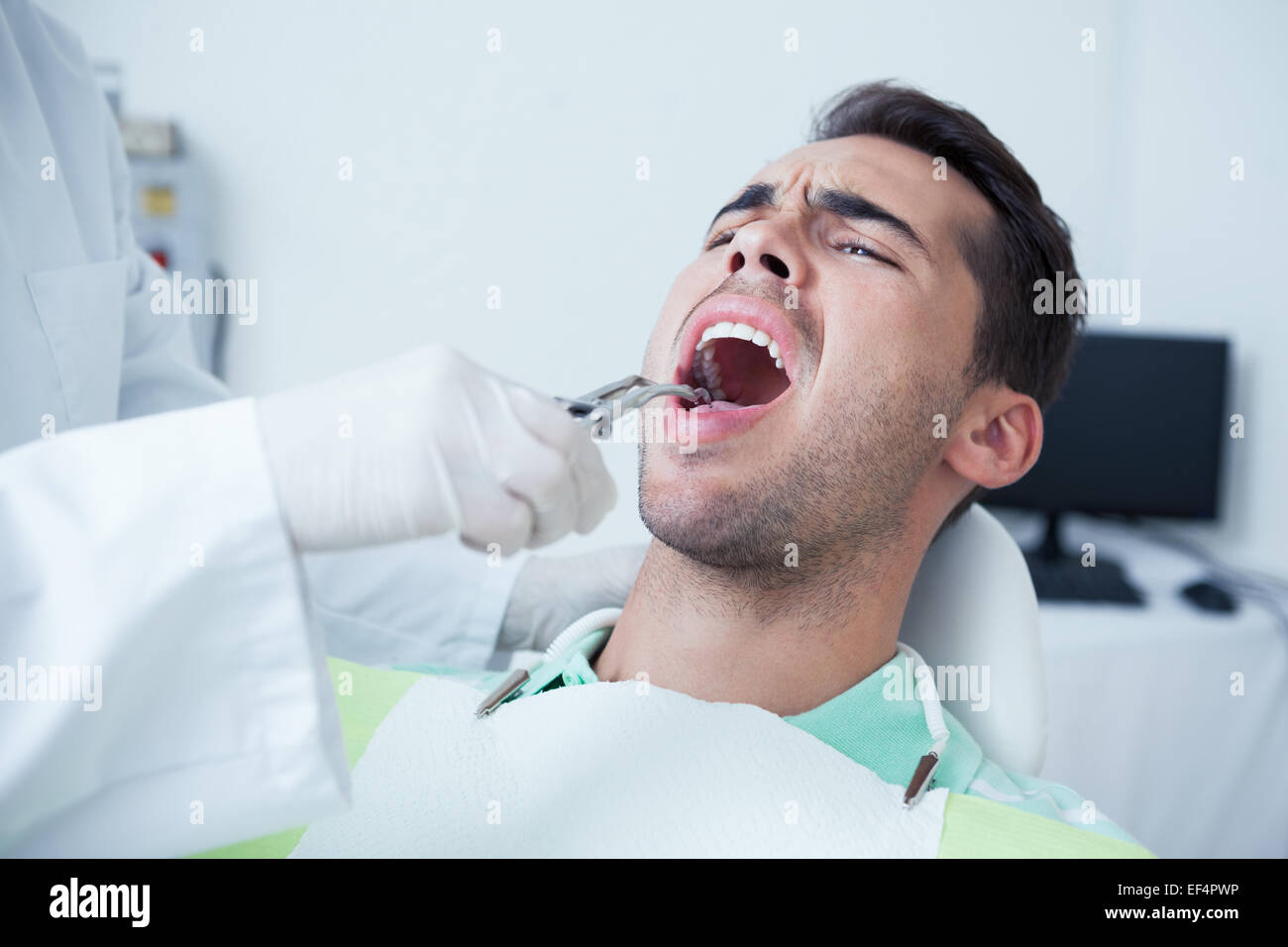 Close up of man having his teeth examined Stock Photo - Alamy