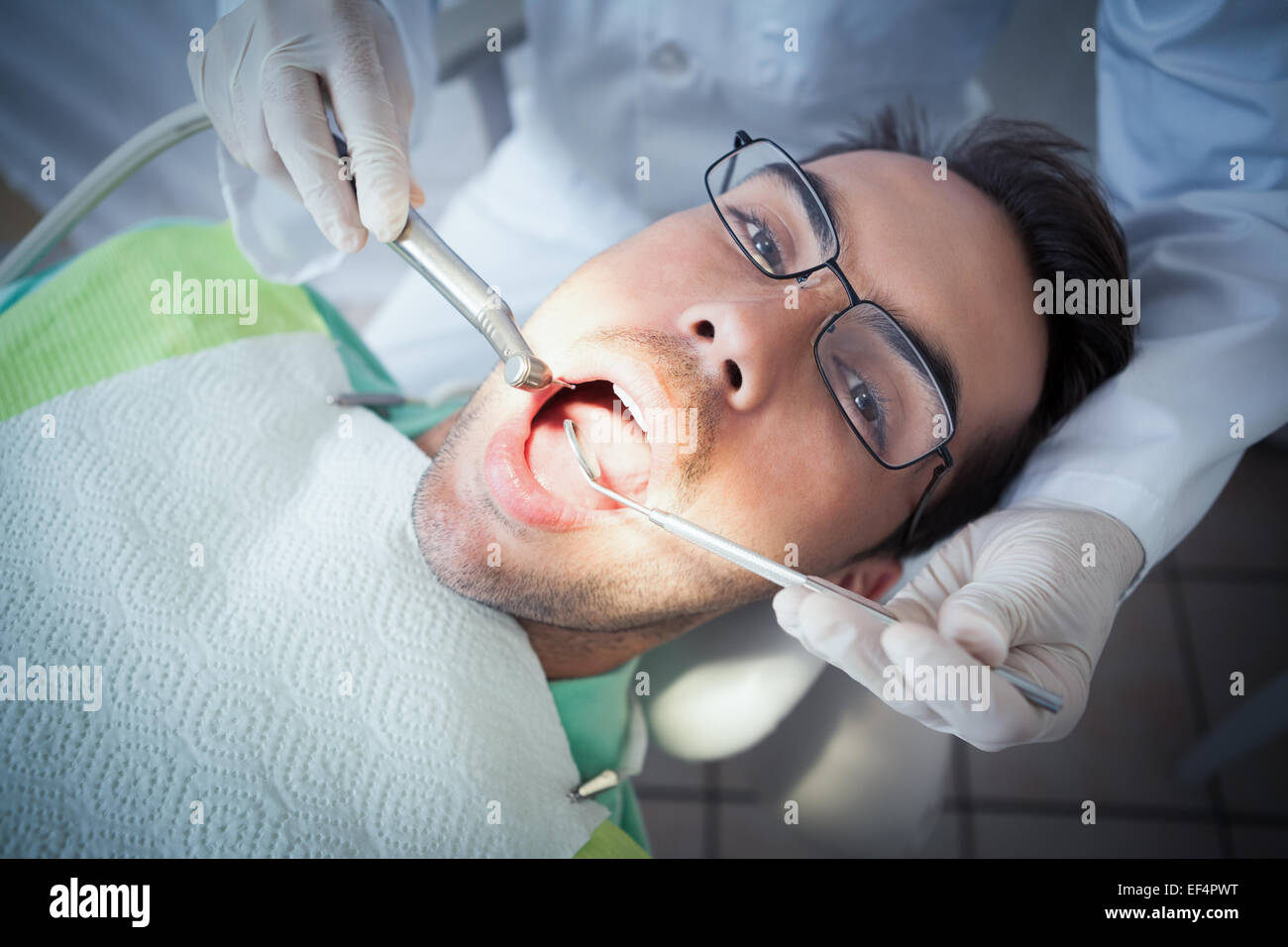 Close up of man having his teeth examined Stock Photo - Alamy