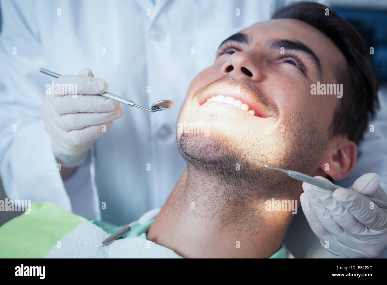 Close up of man having his teeth examined Stock Photo - Alamy