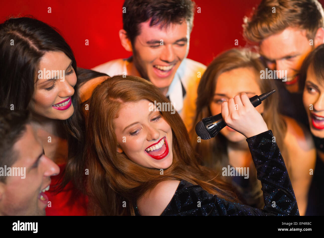 Friends singing together hi-res stock photography and images - Alamy