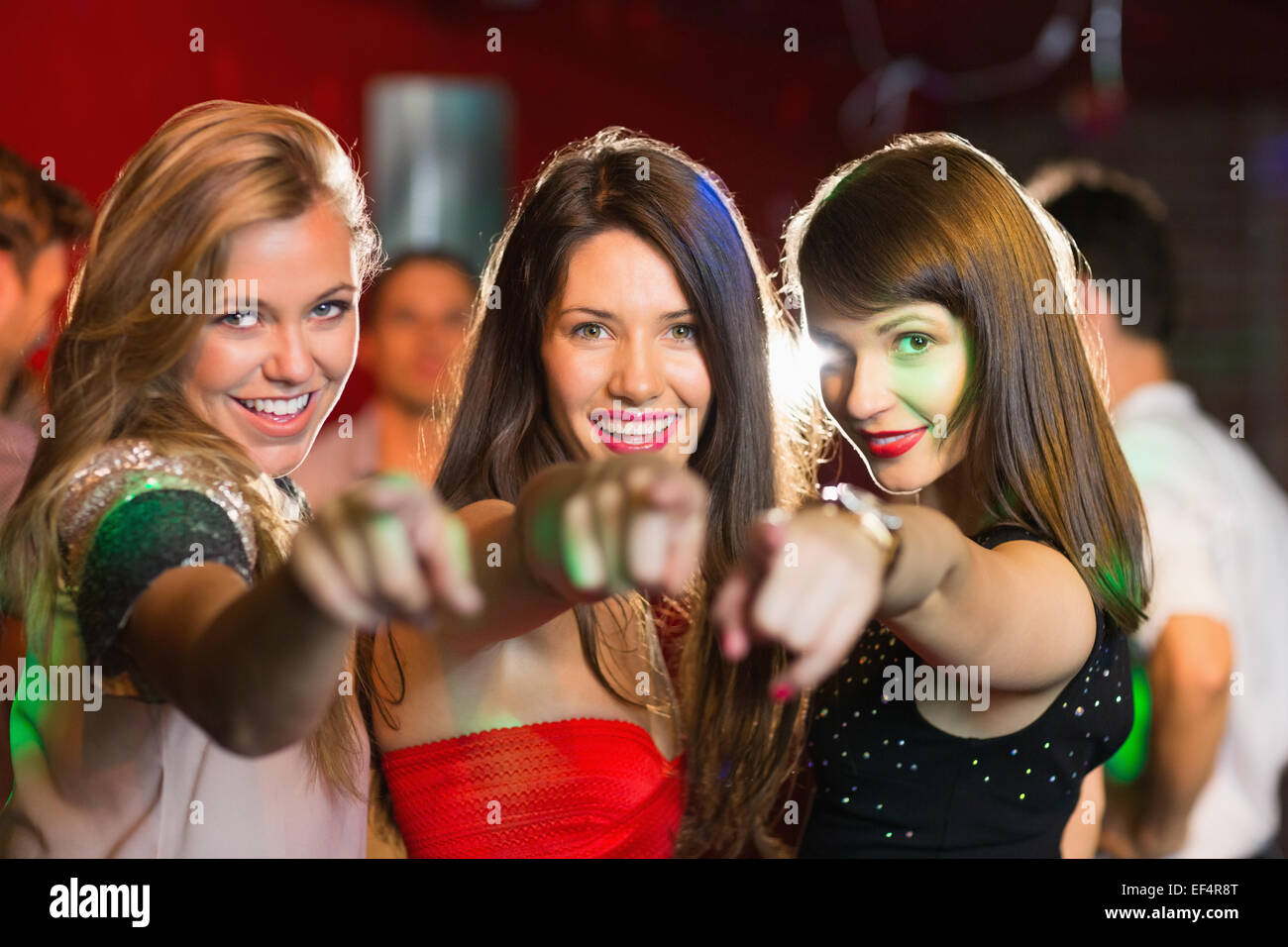 Celebration pointing smiling happy hi-res stock photography and images ...
