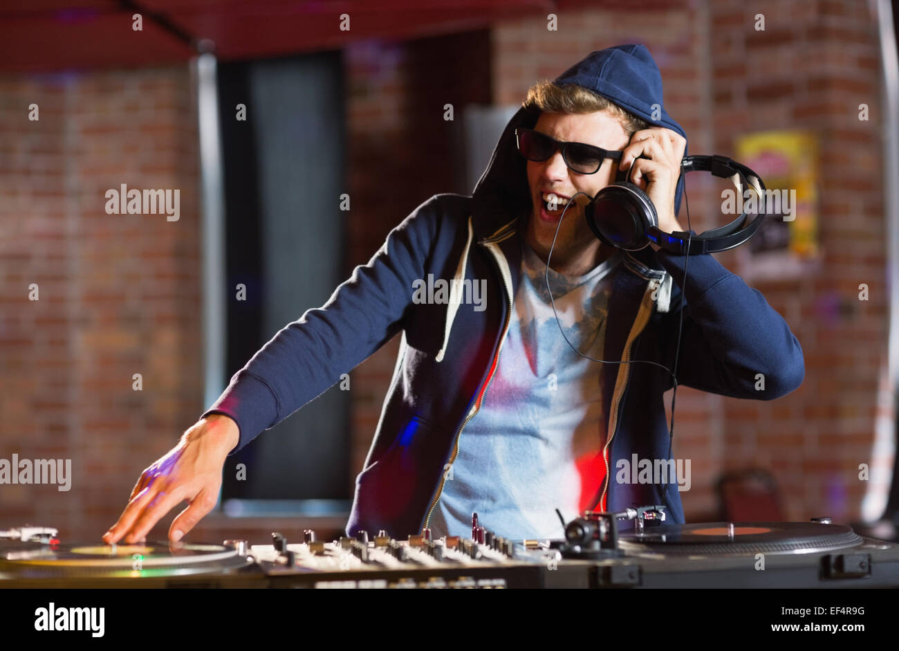 Cool dj spinning the decks Stock Photo - Alamy