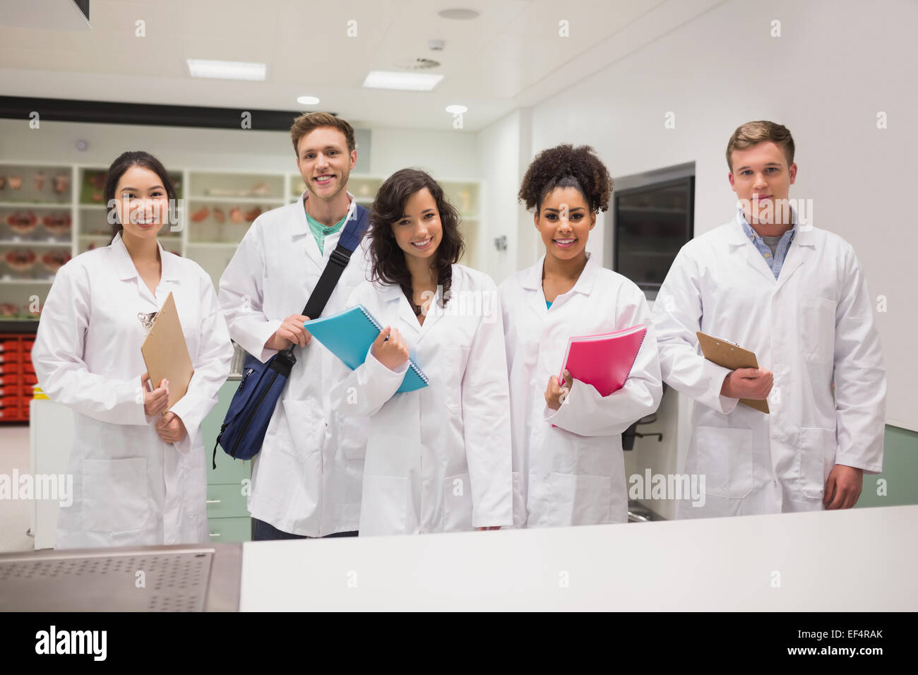 Medical students smiling at camera Stock Photo - Alamy