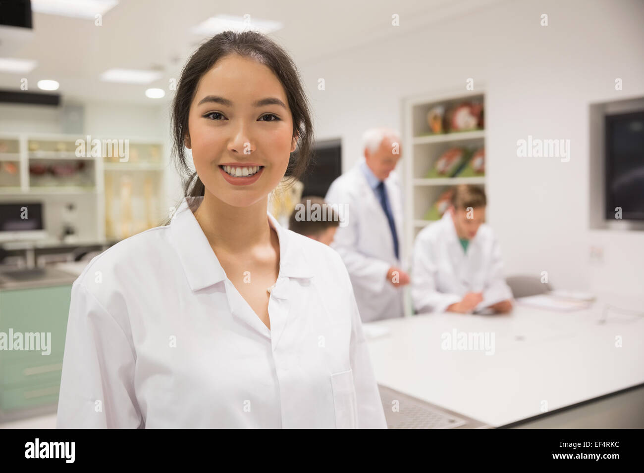 Woman microscope 70s hi-res stock photography and images - Alamy