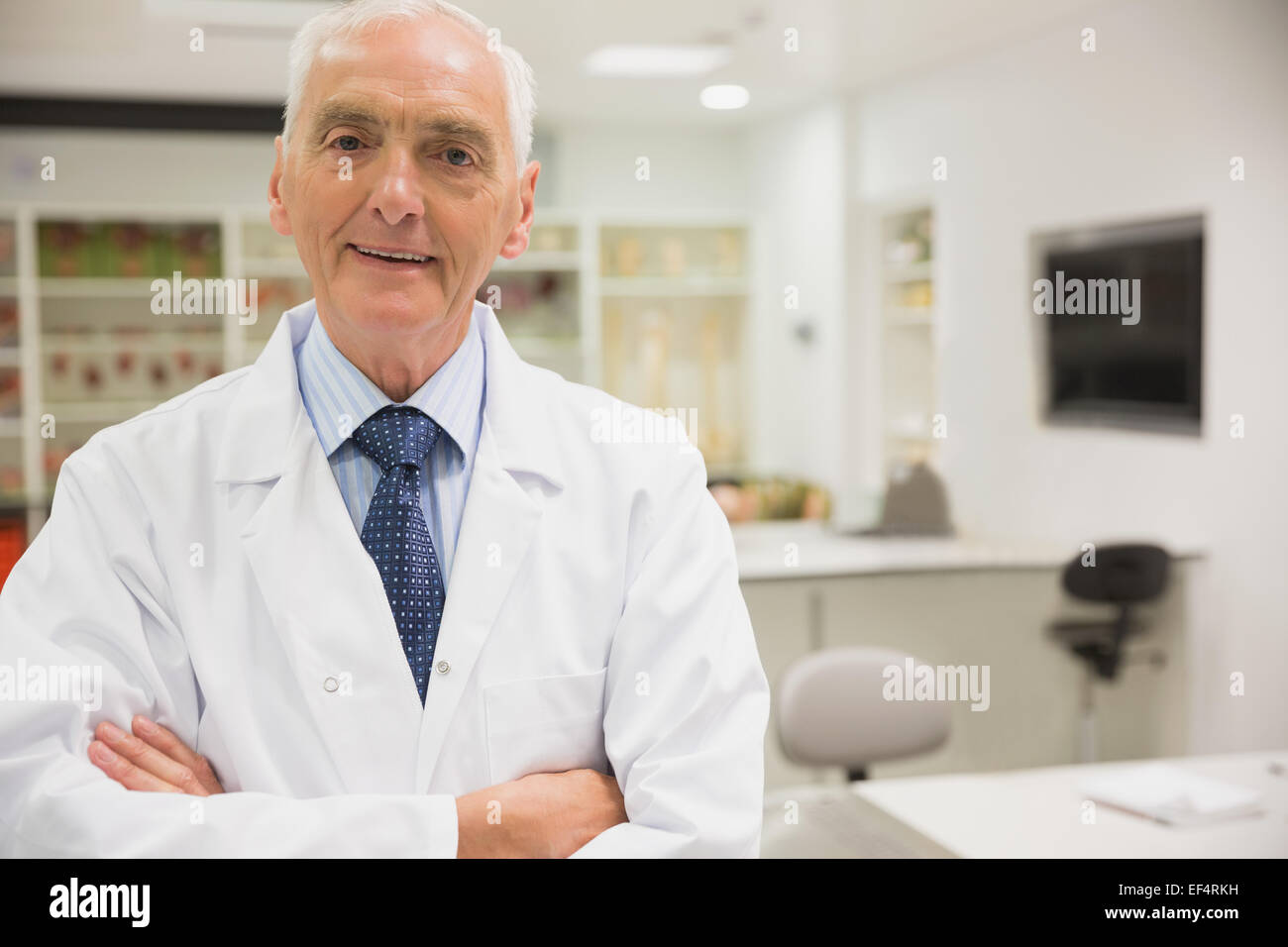Science professor smiling at camera Stock Photo - Alamy
