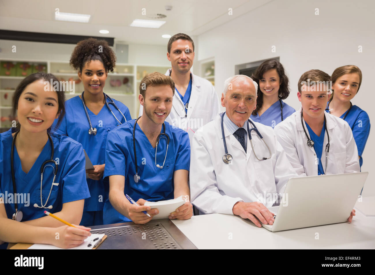 Mid adult doctor laptop young student hi-res stock photography and ...