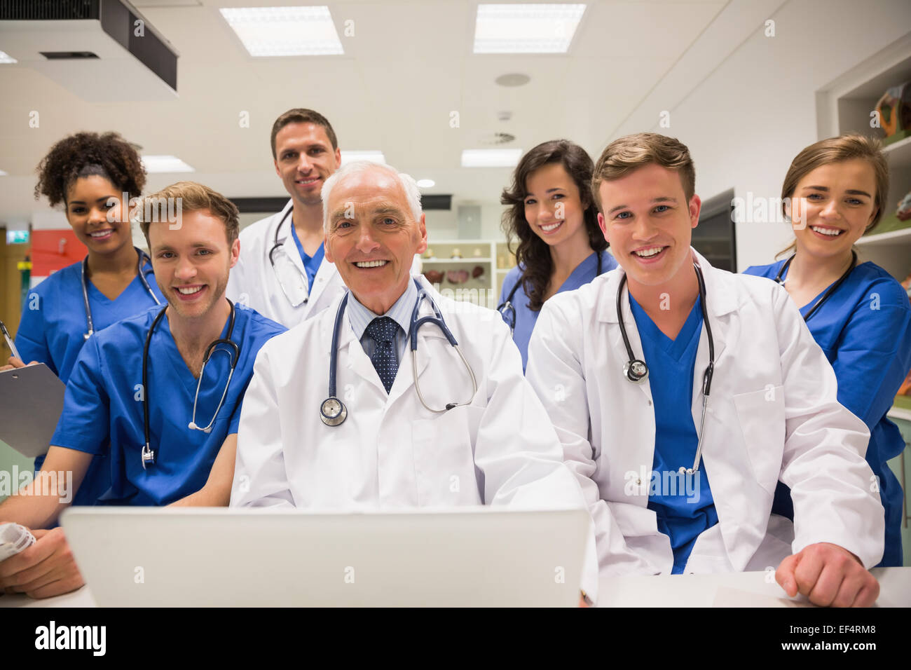 Mid adult doctor laptop young student hi-res stock photography and ...