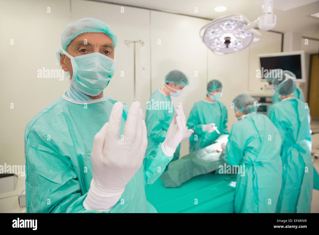 Medical students practicing surgery on model Stock Photo - Alamy