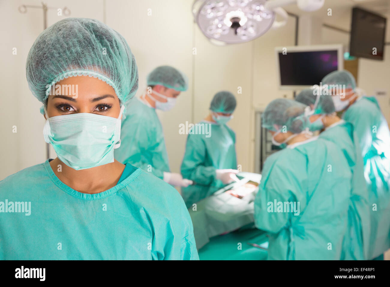 Medical students practicing surgery on model Stock Photo - Alamy