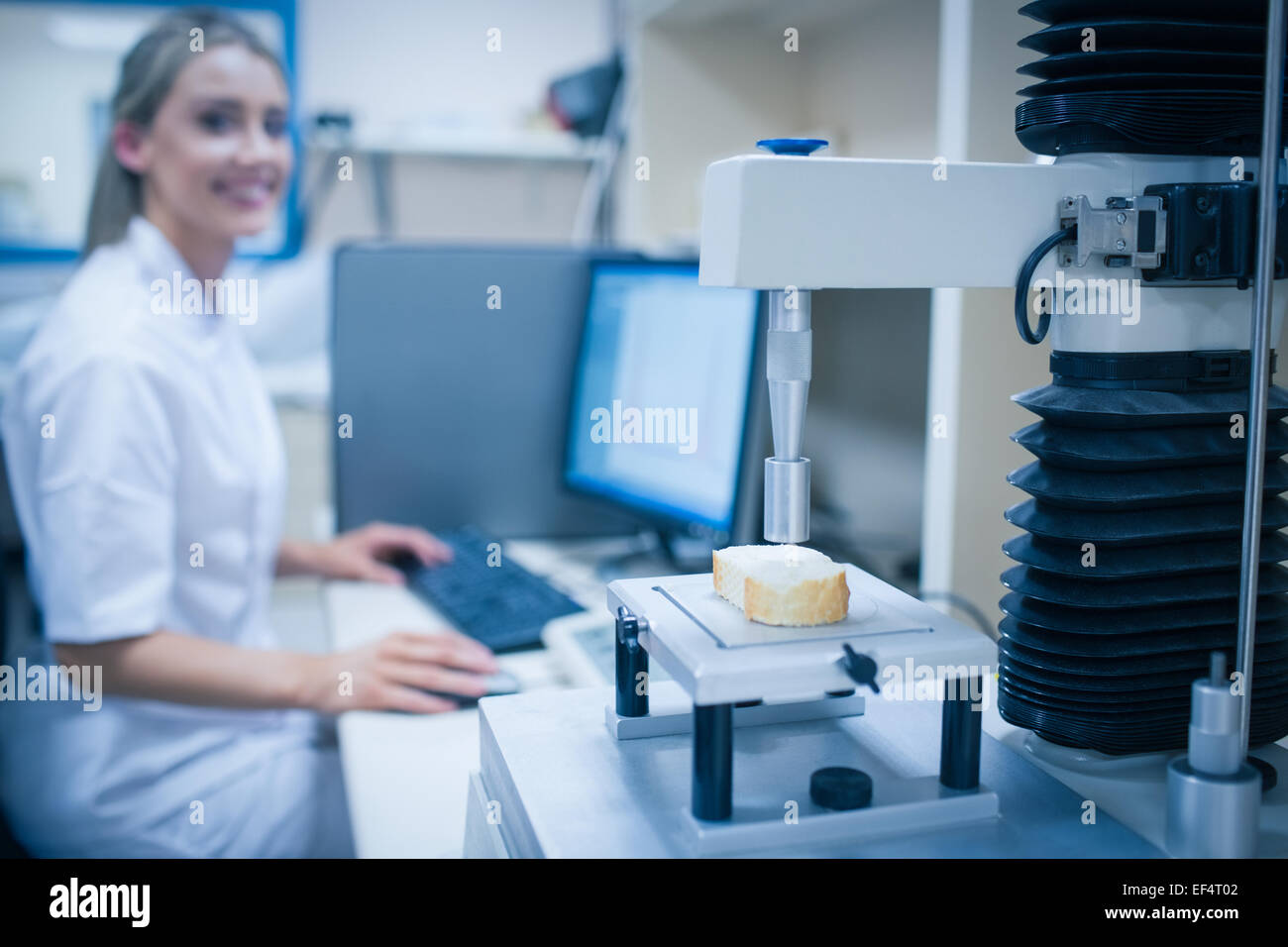 Food scientist using technology to analyse bread Stock Photo - Alamy