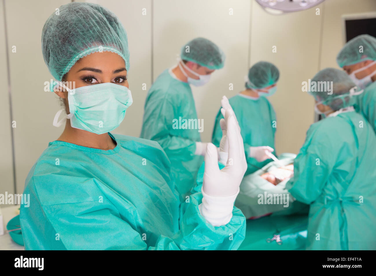 Medical students practicing surgery on model Stock Photo - Alamy