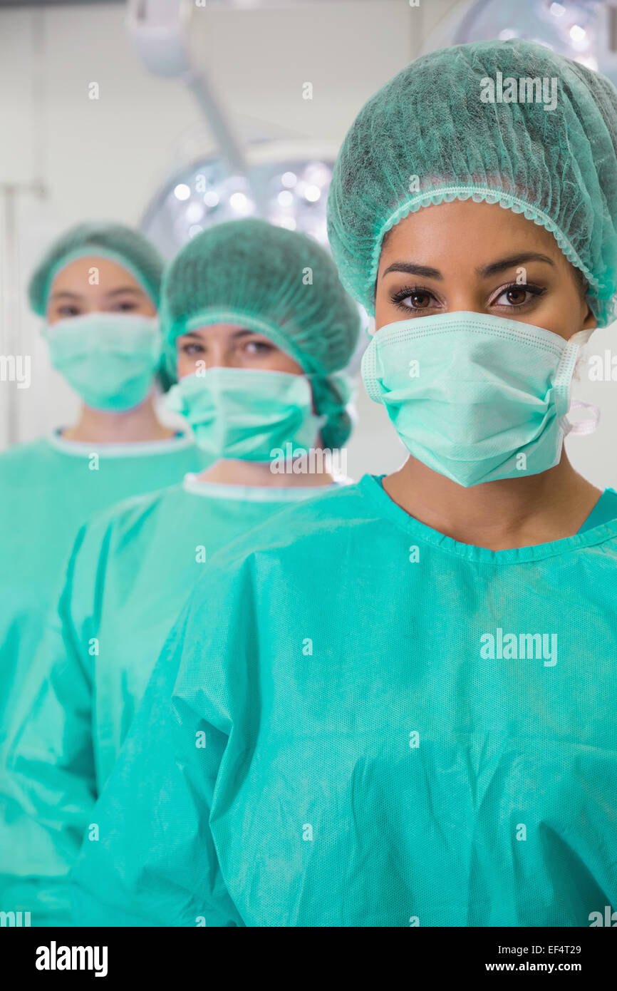 Medical students in operating theater looking at camera Stock Photo - Alamy
