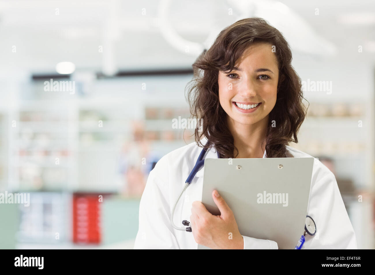 Pretty medical student smiling at camera Stock Photo - Alamy