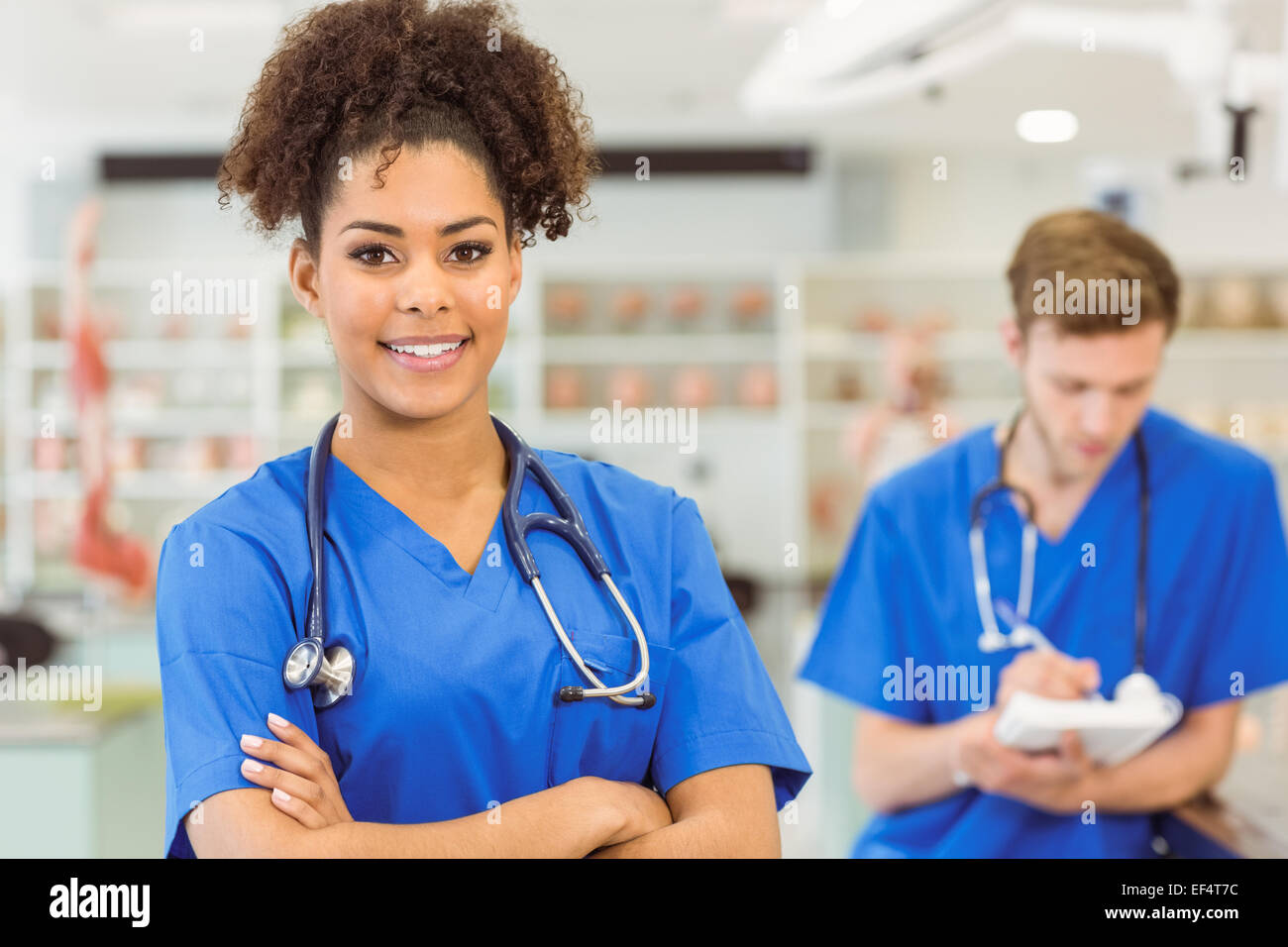 Young medical student smiling at the camera Stock Photo - Alamy